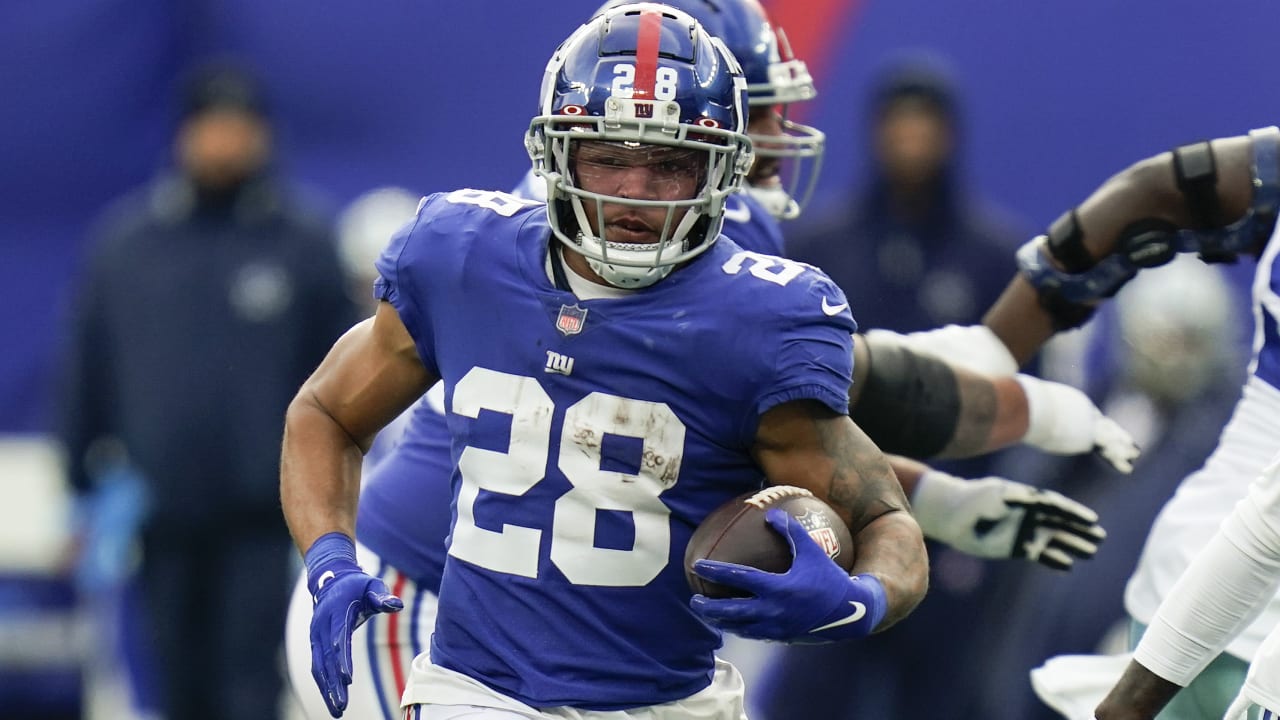 New York Giants running back Devontae Booker explodes through crease on ...