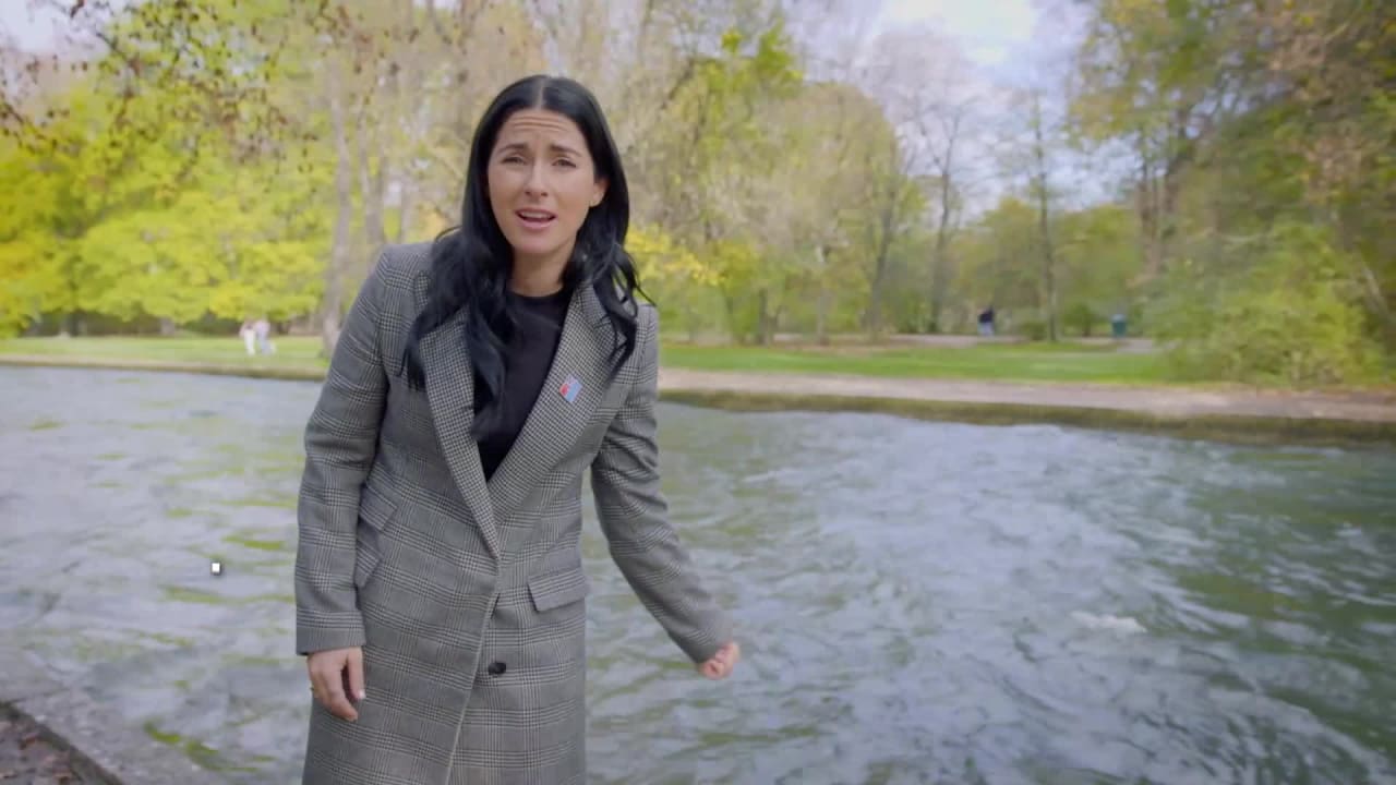 NFL Network's Rachel Bonnetta surfs the Eisbach River in Munich, Germany