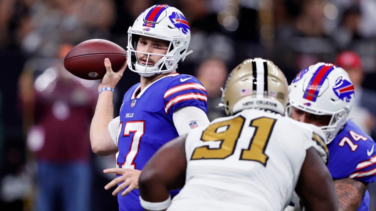 Buffalo Bills quarterback Josh Allen floats 26-yard pass on the run to wide receiver Gabriel Davis