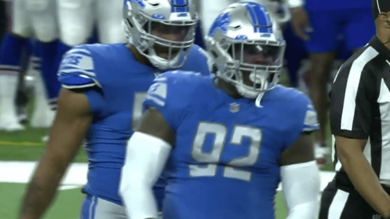 Detroit Lions defensive end Kevin Strong flexes after downing RB for ...