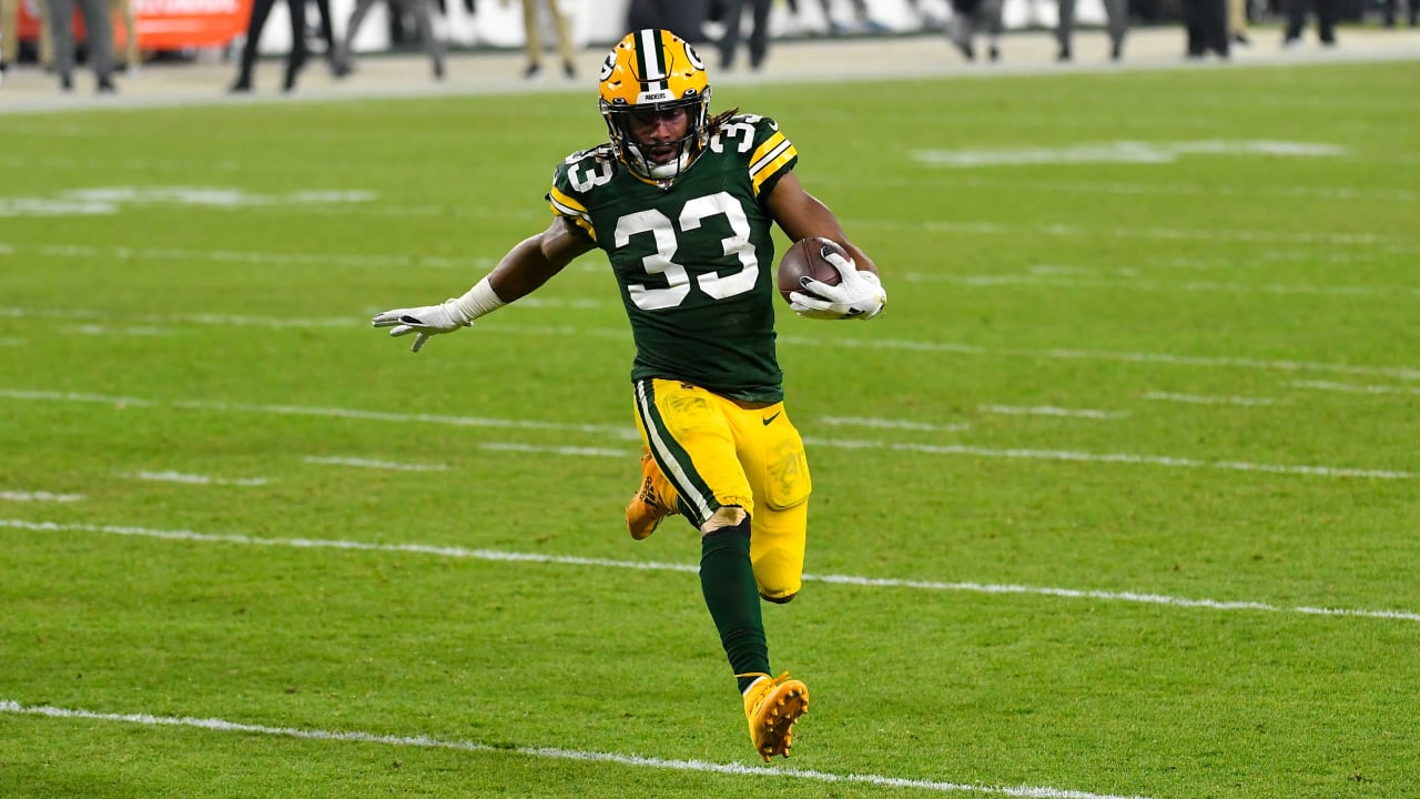 Green Bay Packers running back Aaron Jones skips in for an untouched ...
