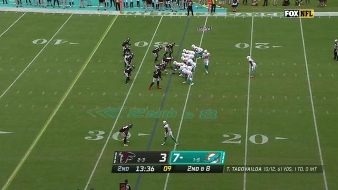 What a move! Miami Dolphins quarterback Tua Tagovailoa jukes his way ...