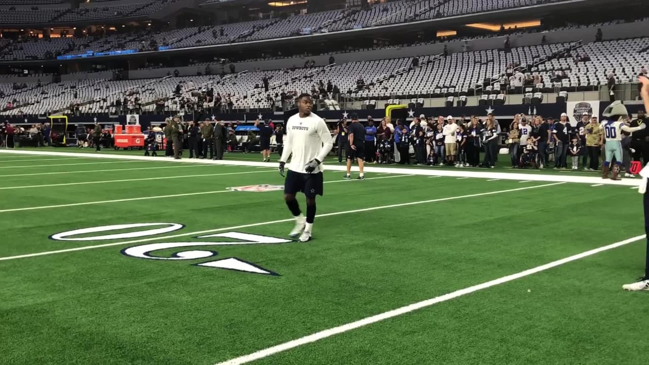 Cooper catches passes before Cowboys debut