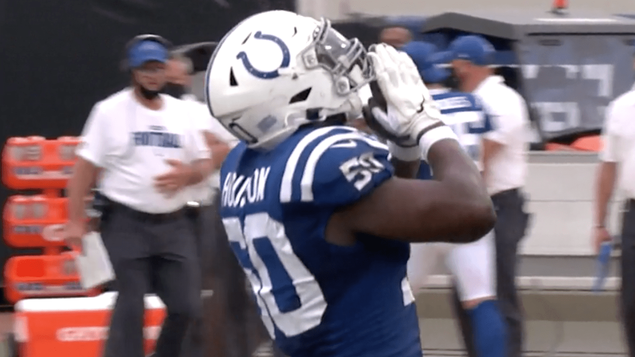 Indianapolis Colts defensive end Justin Houston brings down ...