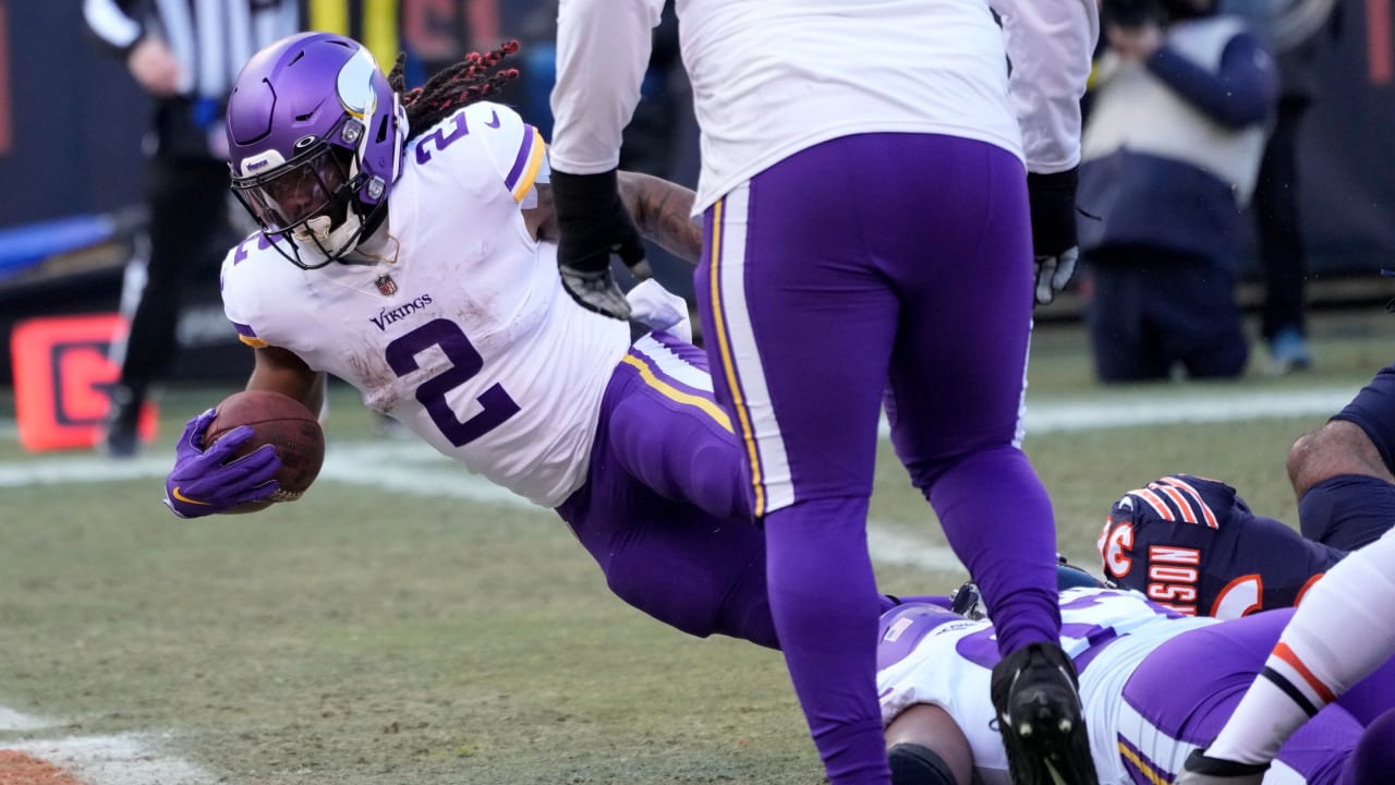 Minnesota Vikings running back Alexander Mattison corkscrews past goal line on 1-yard TD run