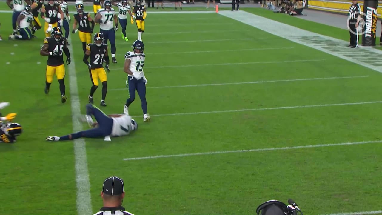 Seattle Seahawks quarterback Geno Smith takes it in himself for a 2 ...