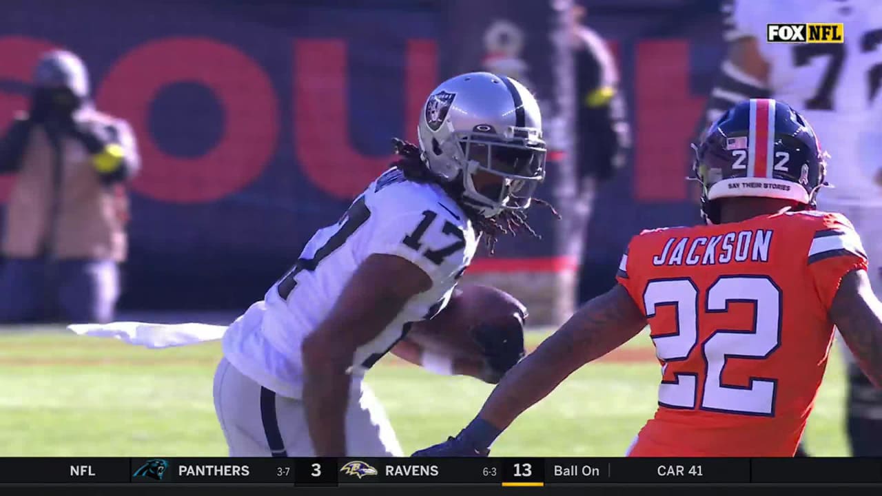 Las Vegas Raiders wide receiver Davante Adams scoops Raiders quarterback Derek Carr's third-down ...