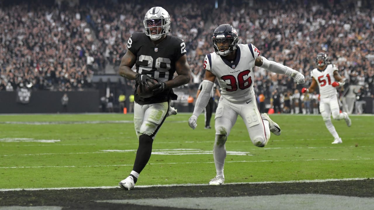 Las Vegas Raiders running back caps a 7-yard touchdown move with a spin ...