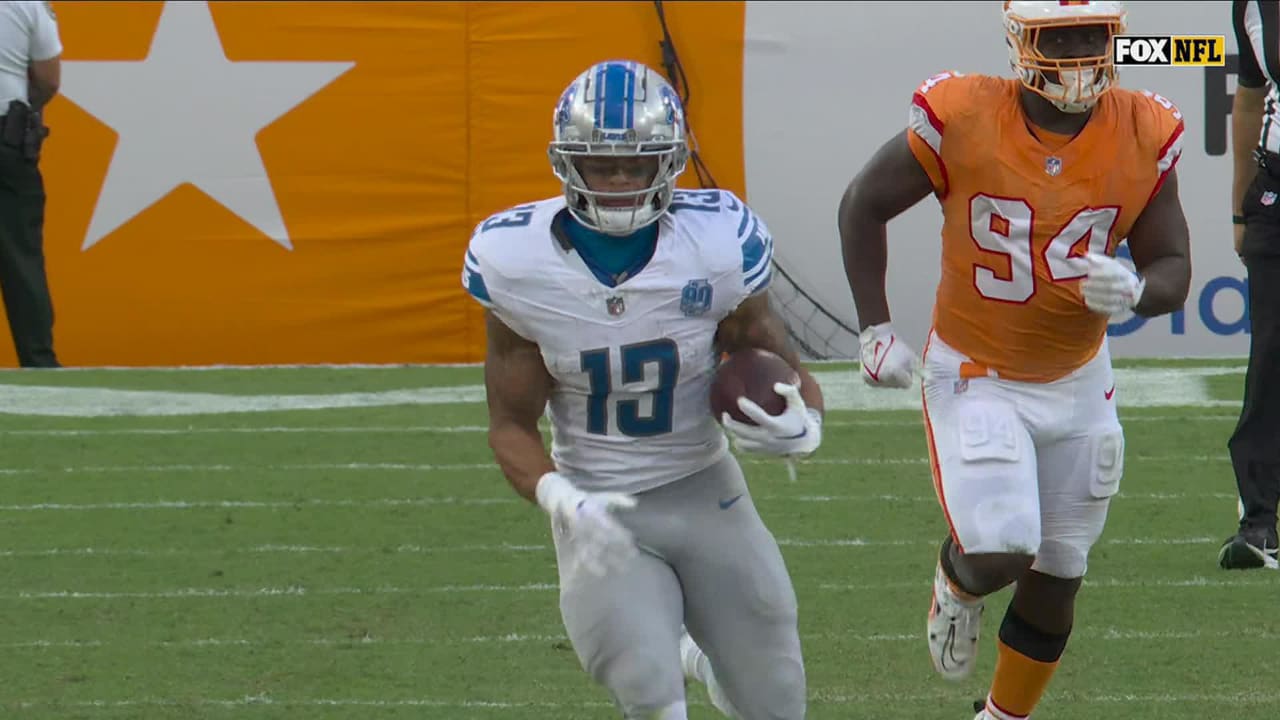 Detroit Lions running back Craig Reynolds explodes out of the pack for ...