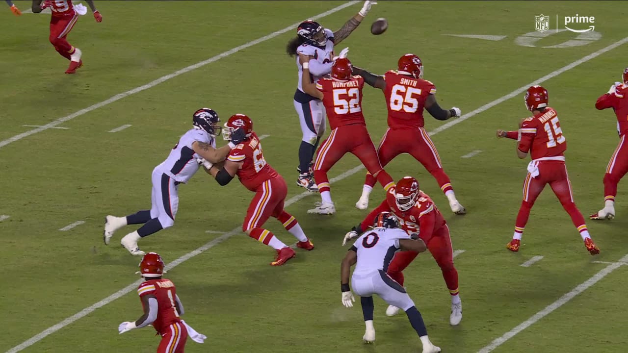 Denver Broncos defensive lineman Mike Purcell bats down Kansas City ...