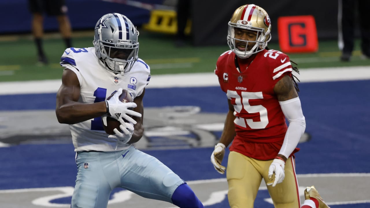 Dallas Cowboys quarterback Andy Dalton shows touch on touchdown dart to ...