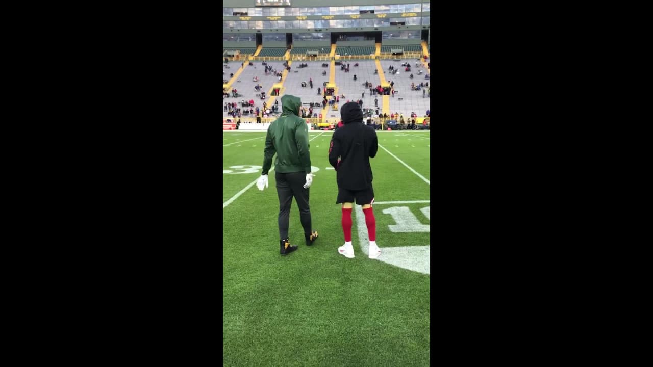 Sherman, Graham hug during pregame warm-ups