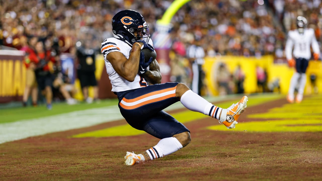 Chicago Bears quarterback Justin Fields darts Bears wide receiver DJ Moore in back corner of end ...