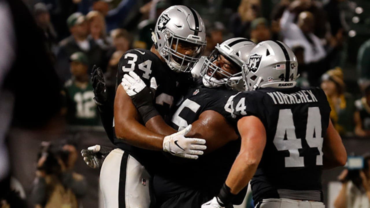 Chris Warren powers his way into the end zone for first TD