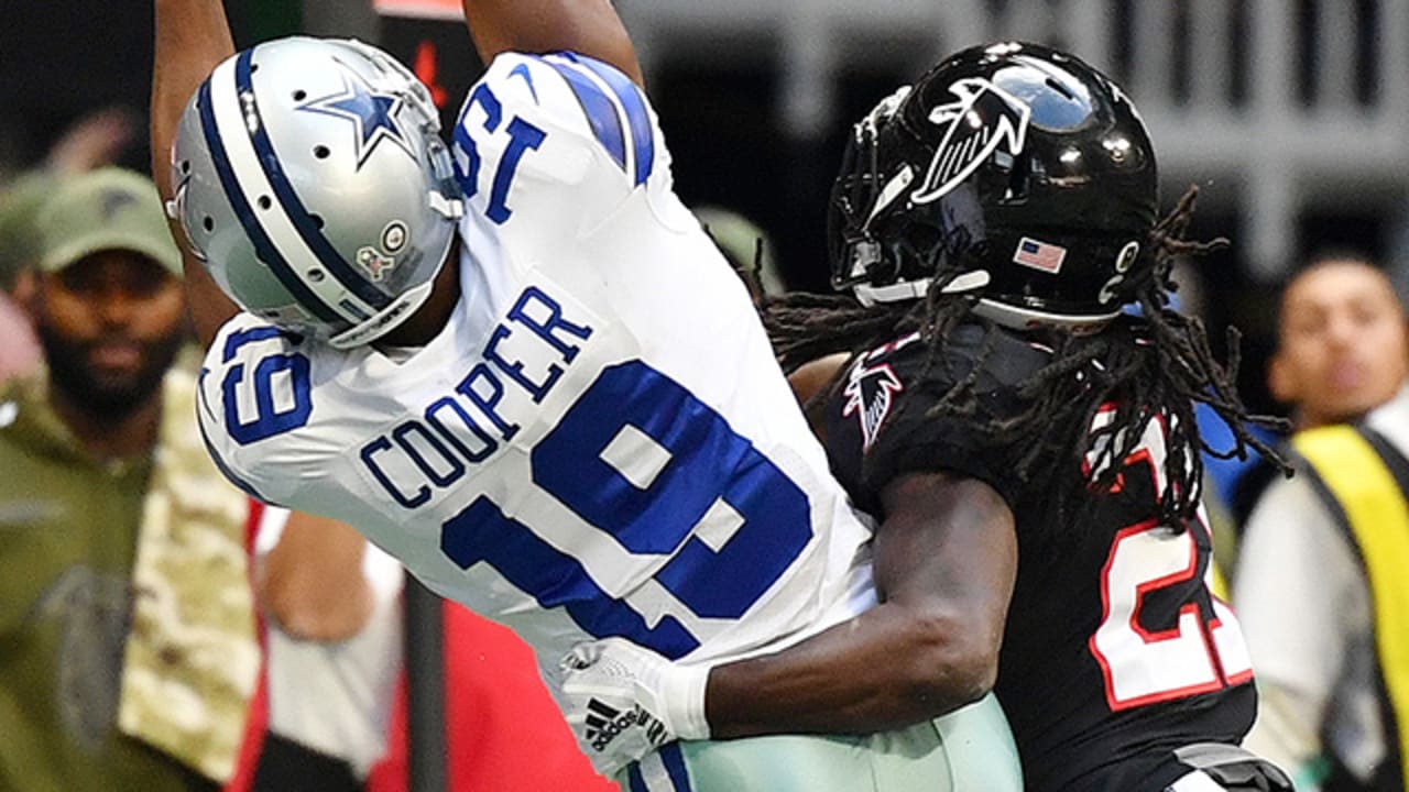 Cooper beats Trufant for big catch