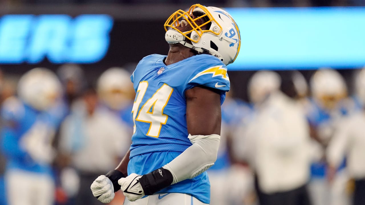 Los Angeles Chargers defensive end Chris Rumph II sheds a Los Angeles ...