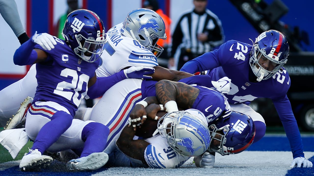 Detroit Lions running back Jamaal Williams plows past goal line for his ...