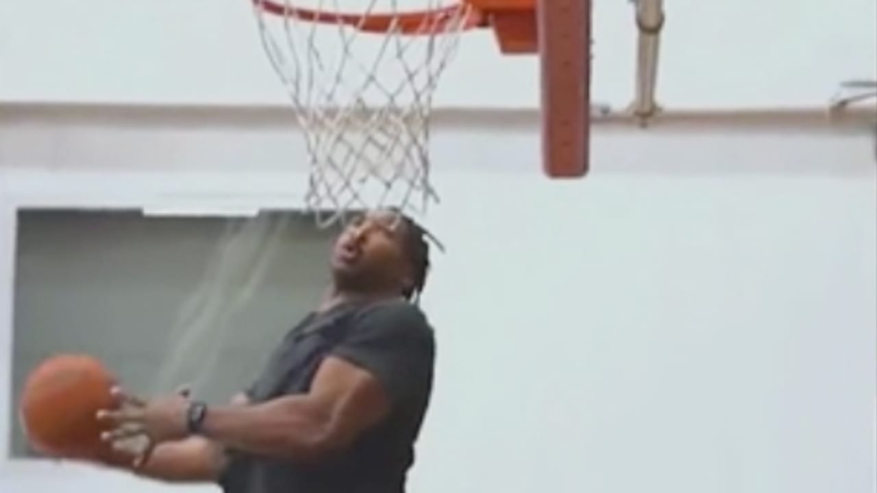 Cleveland Browns defensive end Myles Garrett shows off his basketball ...