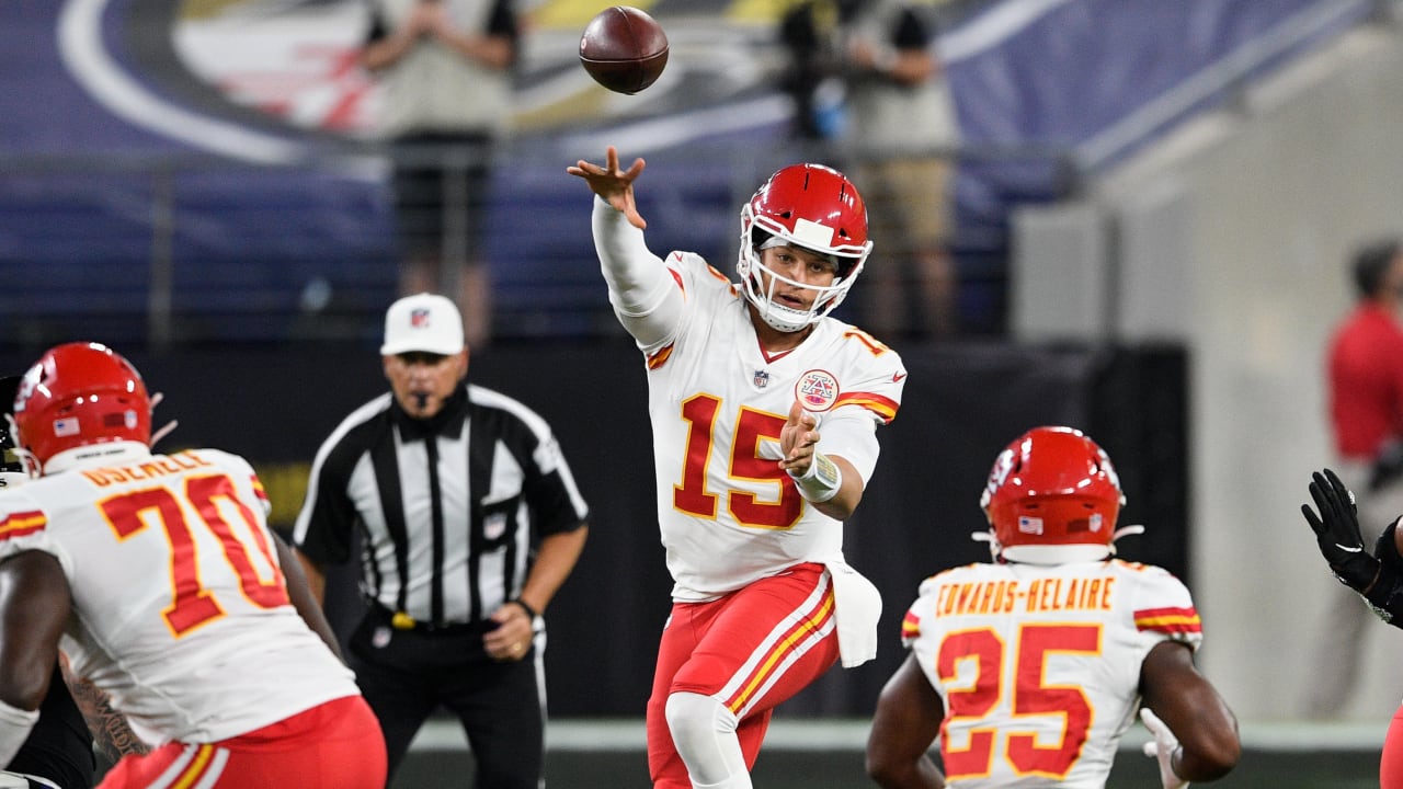 Kansas City Chiefs quarterback Patrick Mahomes escapes Ravens' pressure ...