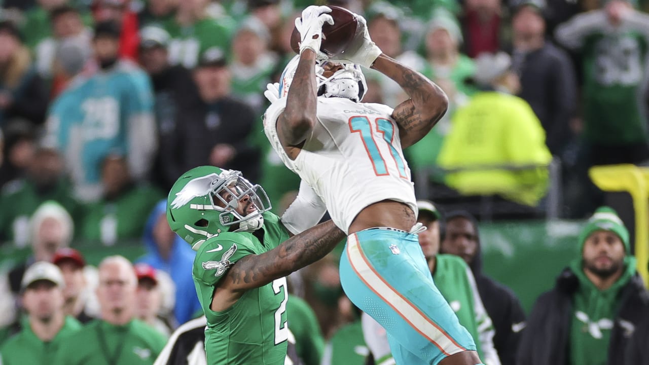 Miami Dolphins wide receiver Cedrick Wilson Jr. climbs the ladder for ...