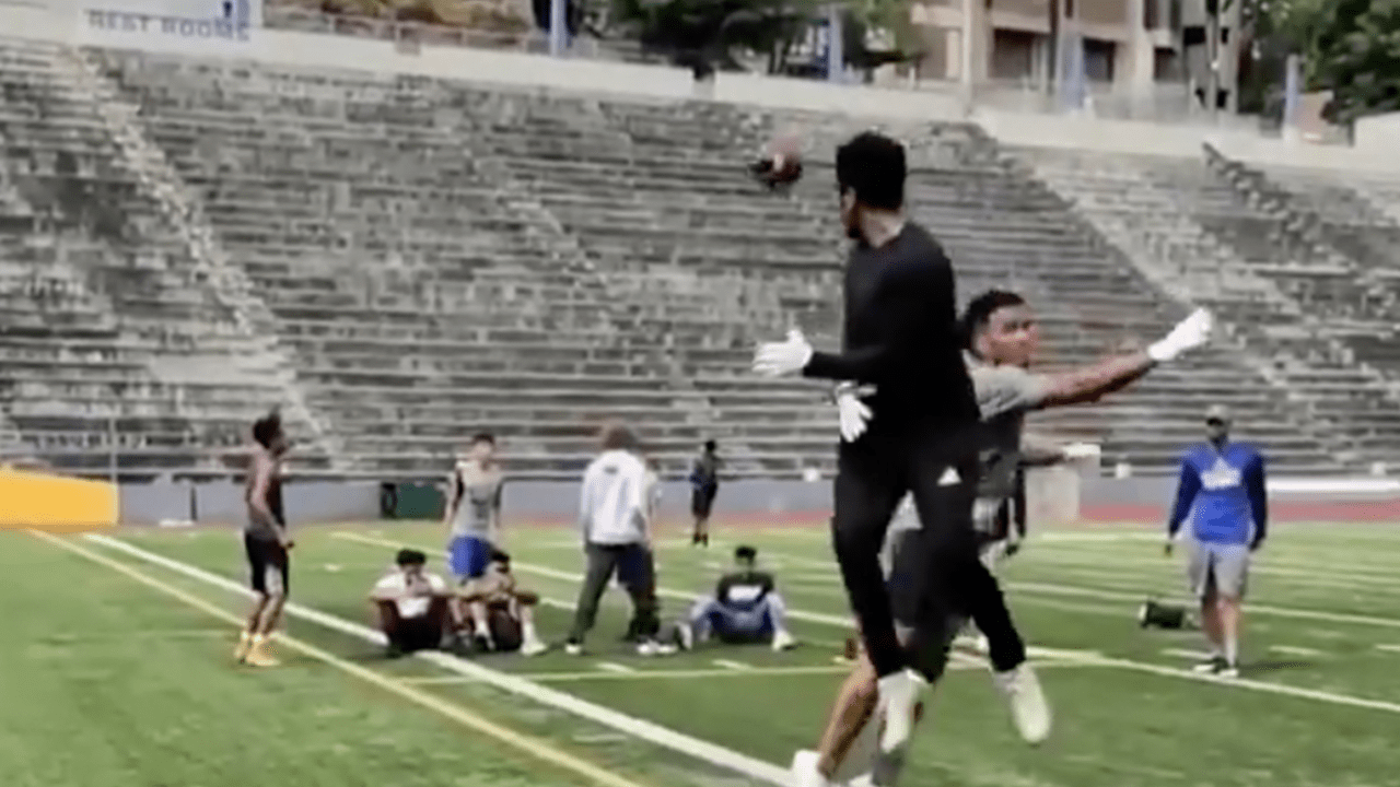 Watch this crazy 360 one-handed catch