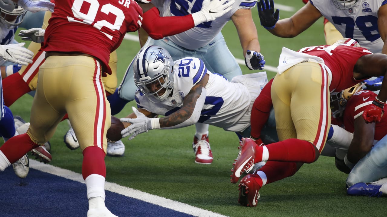 Dallas Cowboys running back Tony Pollard extends ball over the goal ...