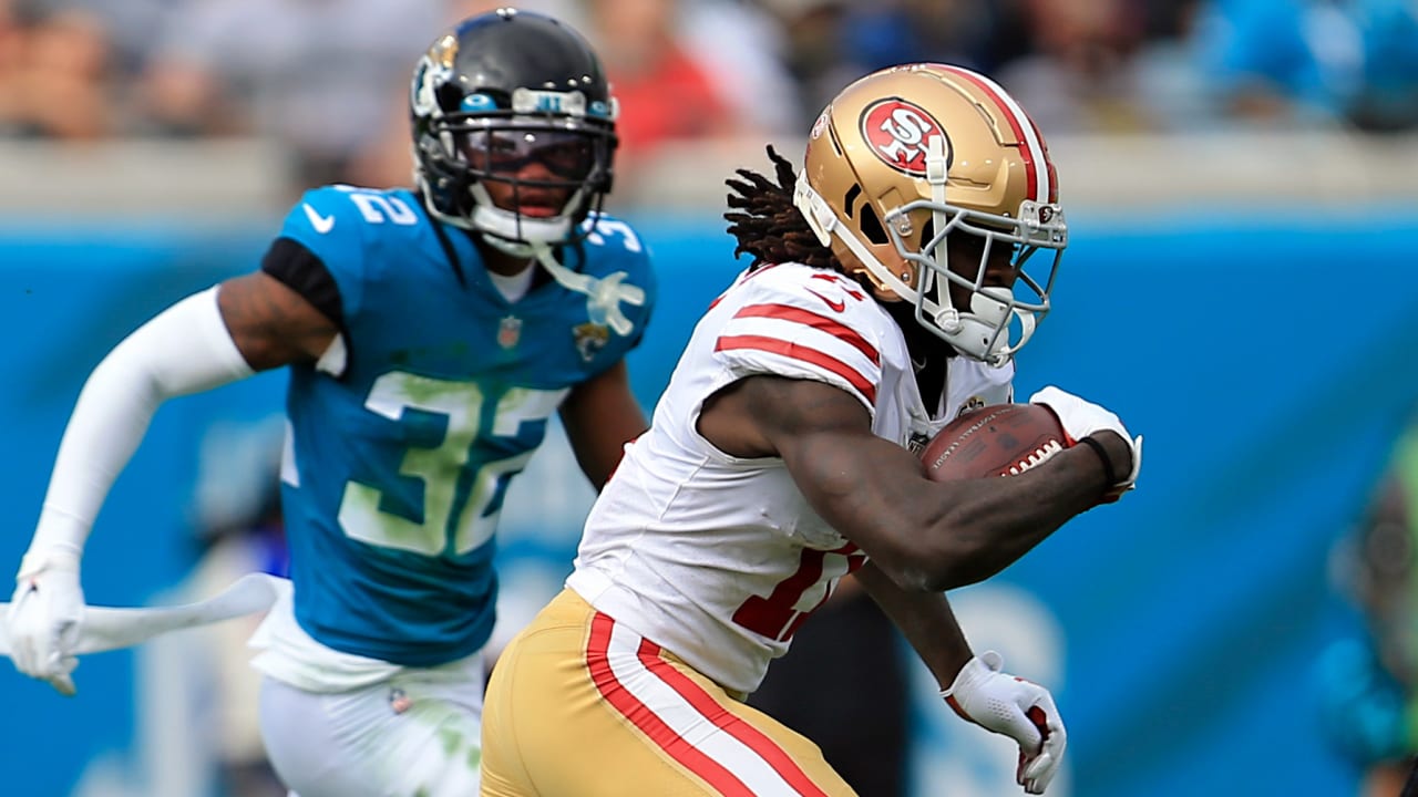 San Francisco 49ers wide receiver Brandon Aiyuk bounces off defender on ...