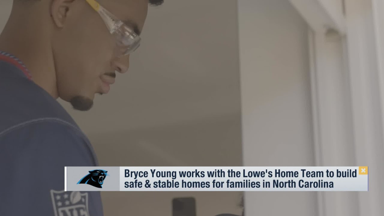 Carolina Panthers quarterback Bryce Young works with the Lowe's Home ...
