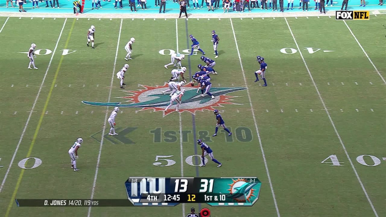 Miami Dolphins linebacker Andrew Van Ginkel fires around the edge for ...