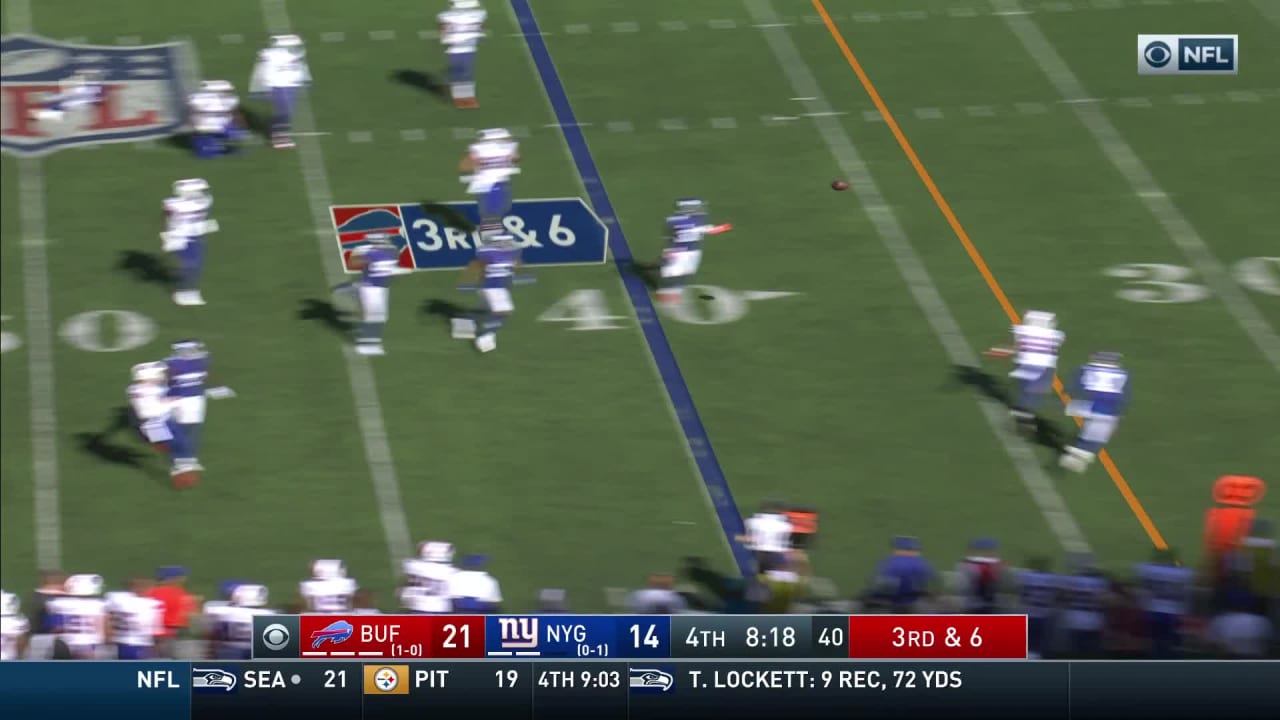 Josh Allen stiff arms defender to the turf on the run for insane first down