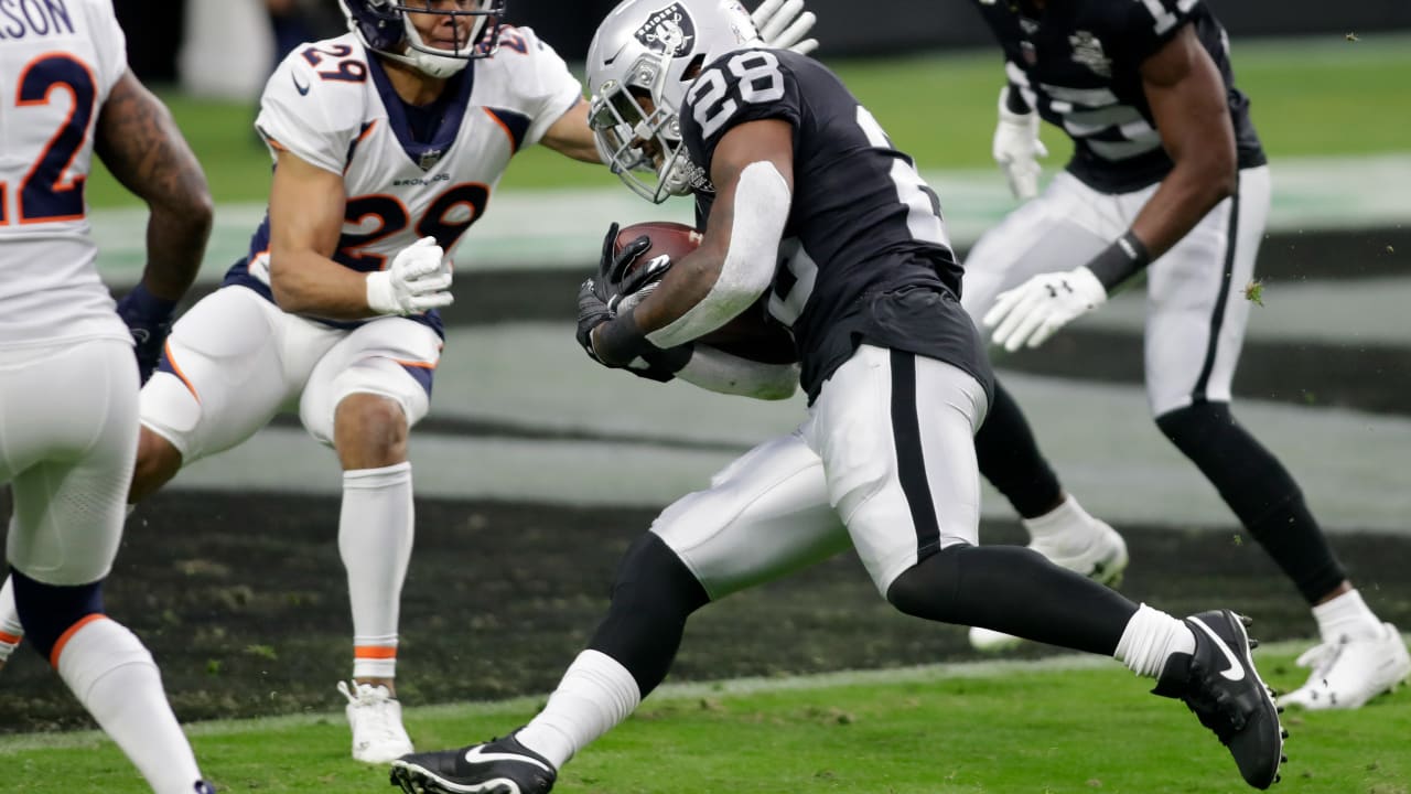 Las Vegas Raiders running back Josh Jacobs gets shifty up the middle ...