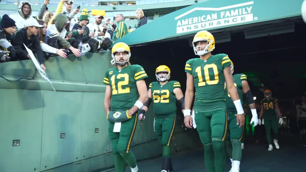 Field View: Green Bay Packers walk out of tunnel in all-green unis