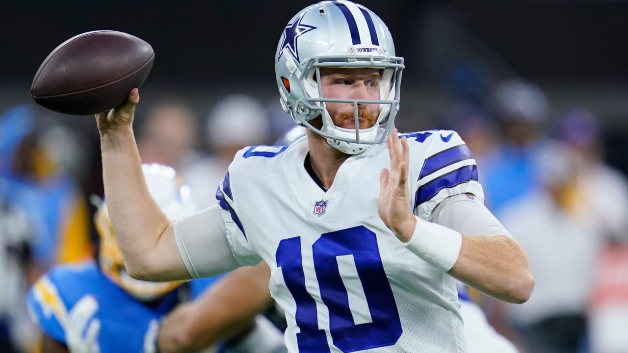 Dallas Cowboys quarterback Cooper Rush flicks a quick two-point throw ...