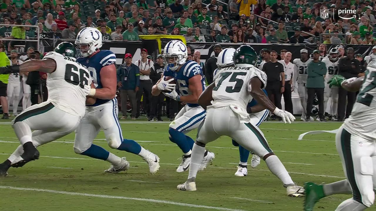 Indianapolis Colts running back Evan Hull plows into the end zone for a ...