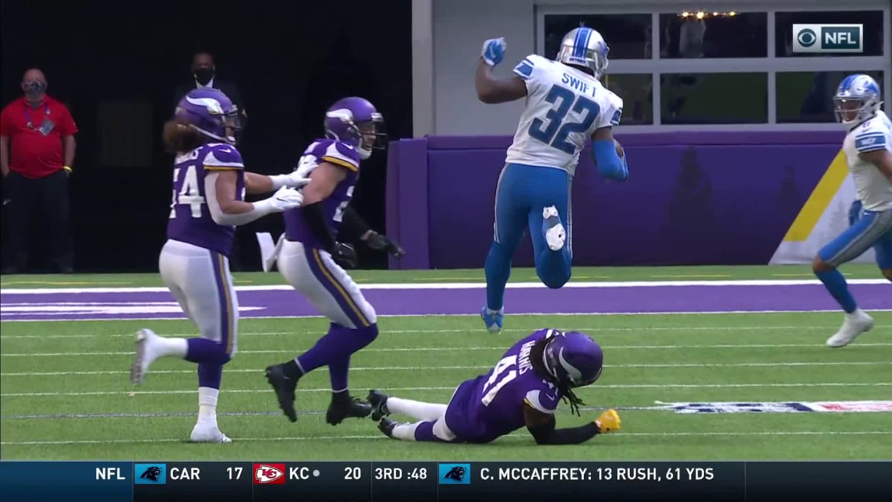 Detroit Lions running back D'Andre Swift uses a mini hurdle to amplify ...