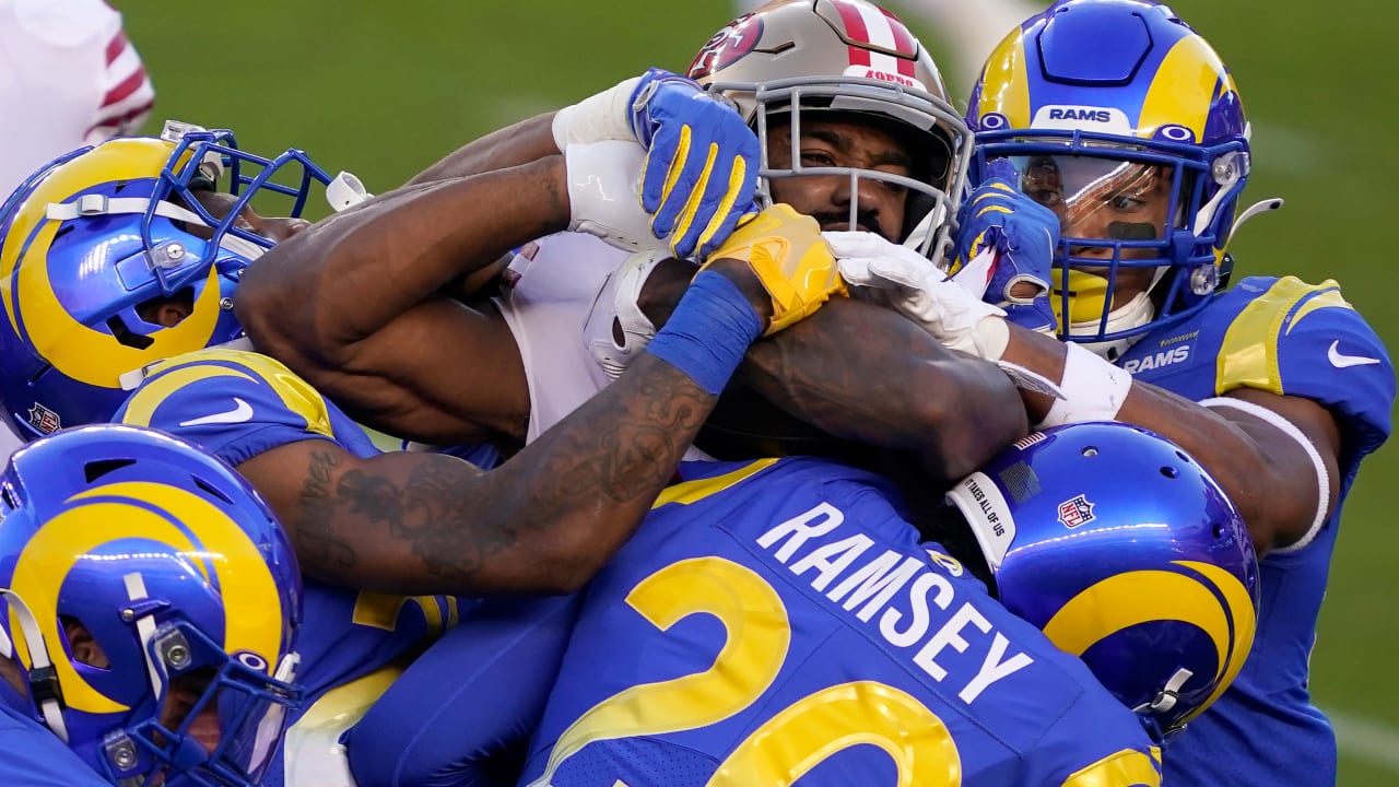 San Francisco 49ers running back Raheem Mostert nearly carries three ...