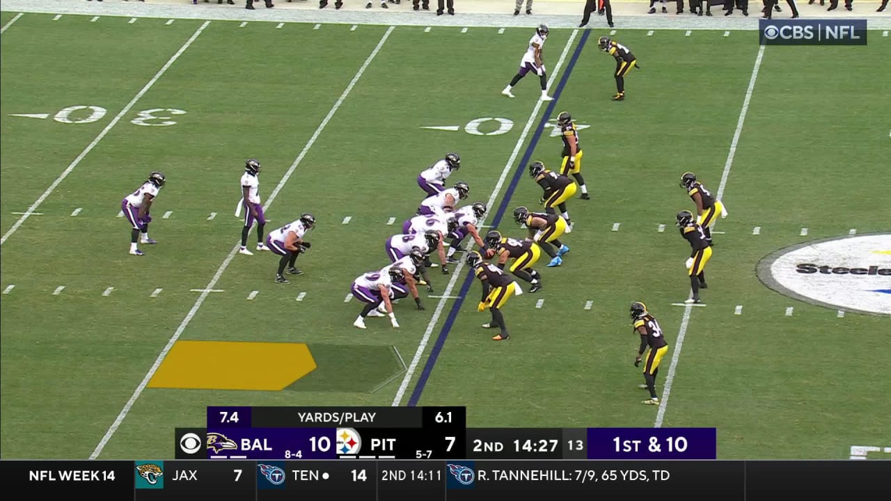 Baltimore Ravens running back Gus Edwards cuts it outside for 16-yard rush
