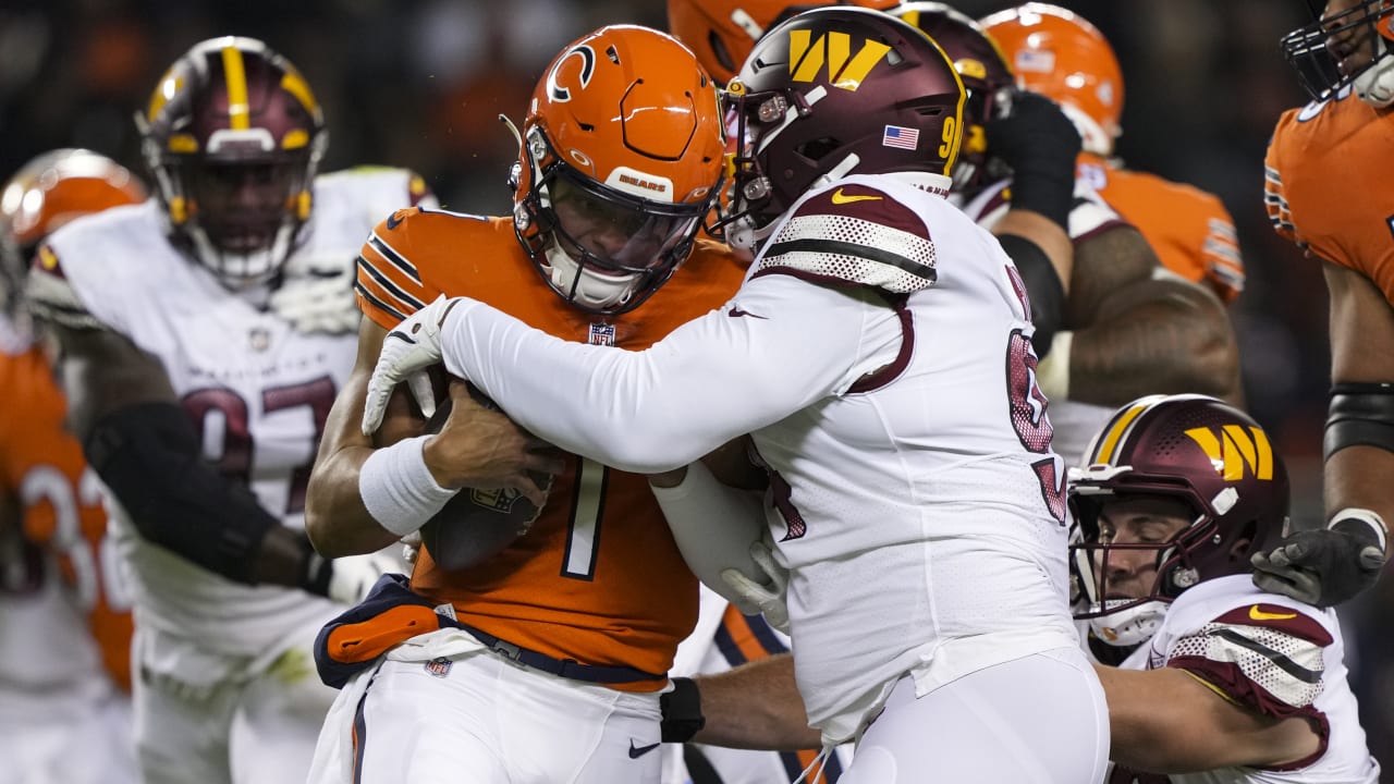 Chicago Bears quarterback Justin Fields engulfed by Washington ...