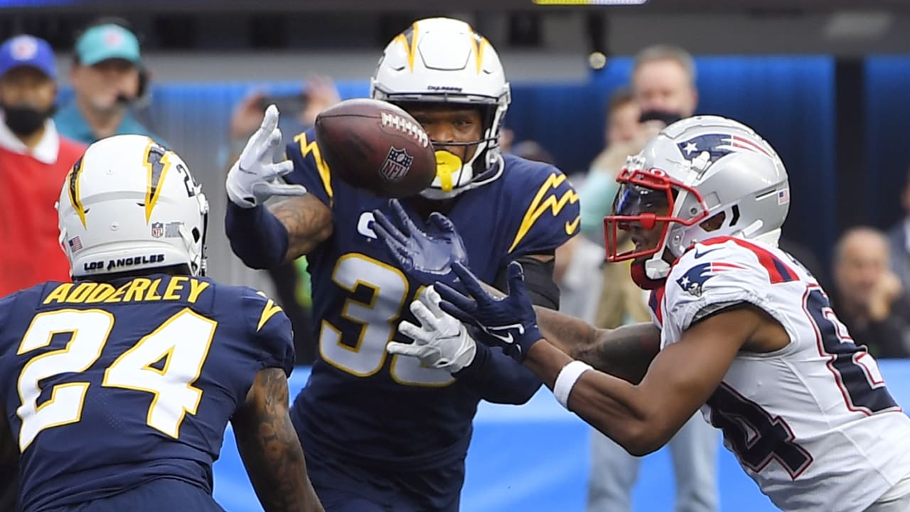Los Angeles Chargers safety Derwin James punches the football out of ...