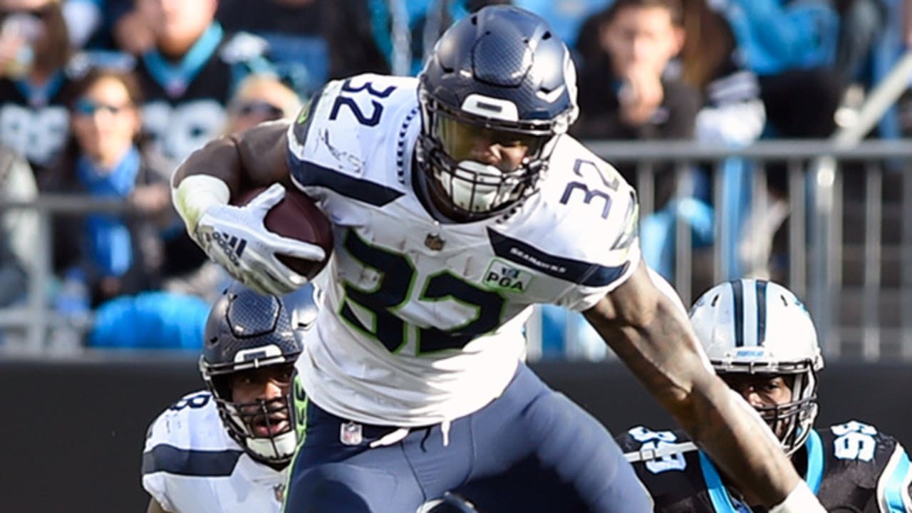 Chris Carson powers into the end zone for TD