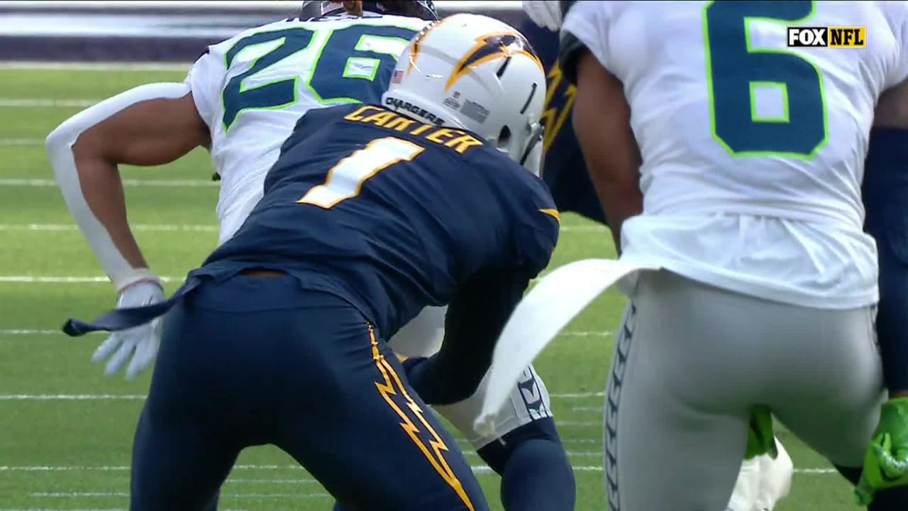 Seattle Seahawks cornerback Ryan Neal reads Los Angeles Chargers ...