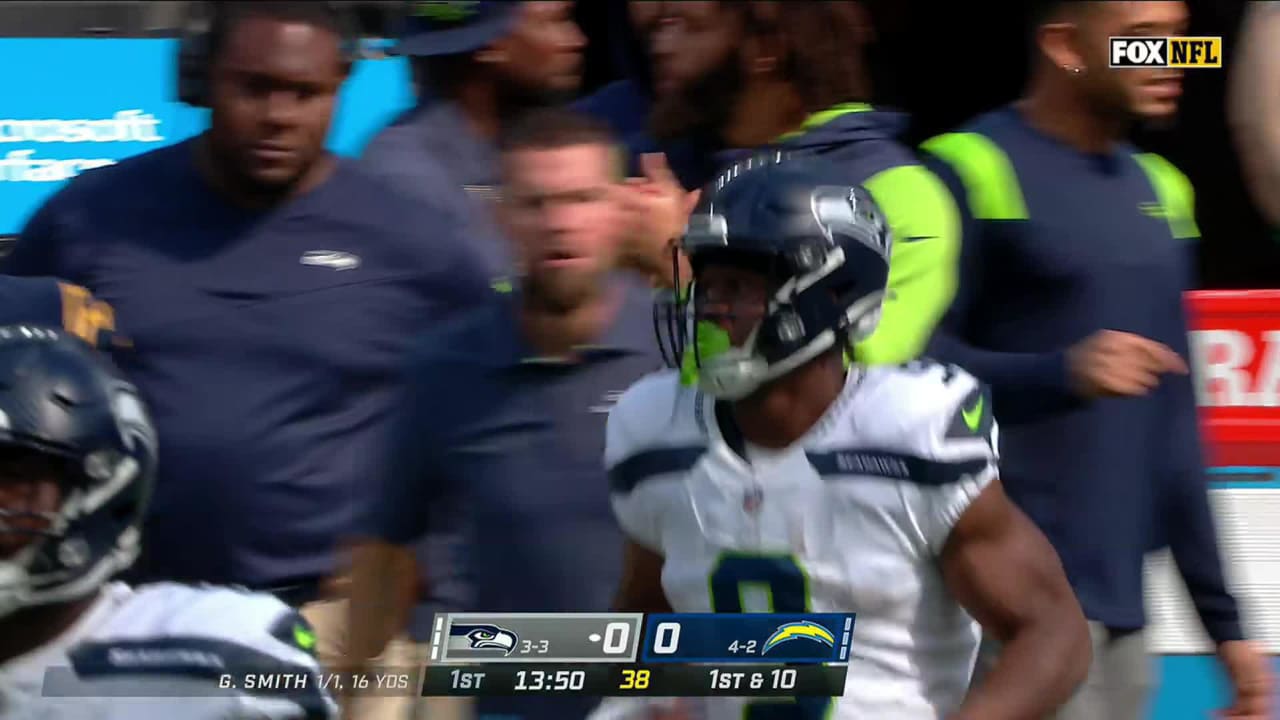 Seattle Seahawks running back Kenneth Walker takes outside lane to gain ...