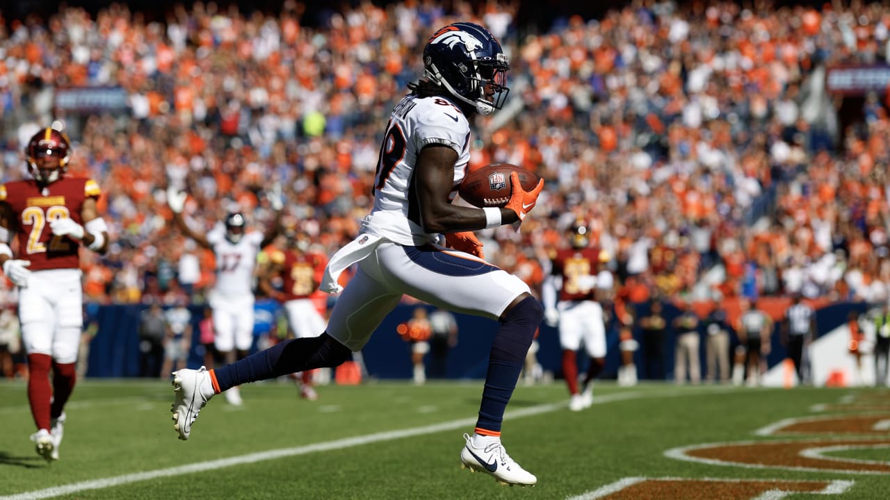 Denver Broncos quarterback Russell Wilson locates wide-open wide ...