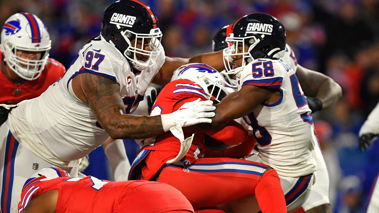 New York Giants linebacker Bobby Okereke shows the extent of his pass ...