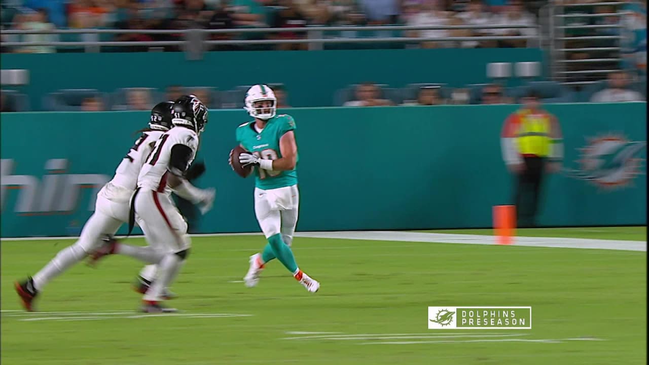 Miami Dolphins quarterback Skylar Thompson dots rookie tight end Elijah ...