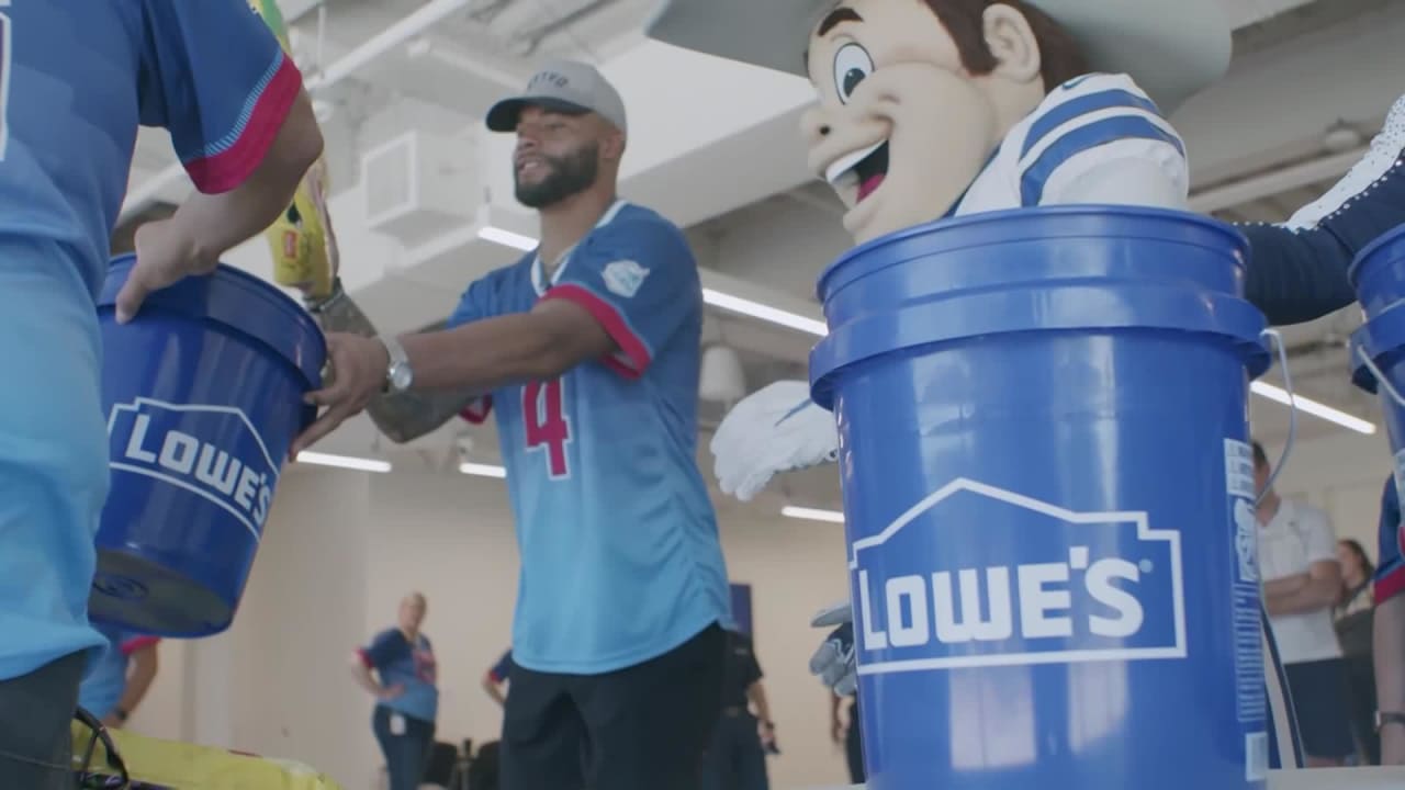 Dallas Cowboys quarterback Dak Prescott works with the Lowe's Home Team ...