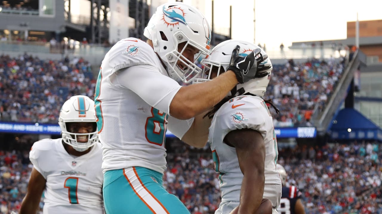 Miami Dolphins wide receiver Jaylen Waddle dives into the end zone for ...