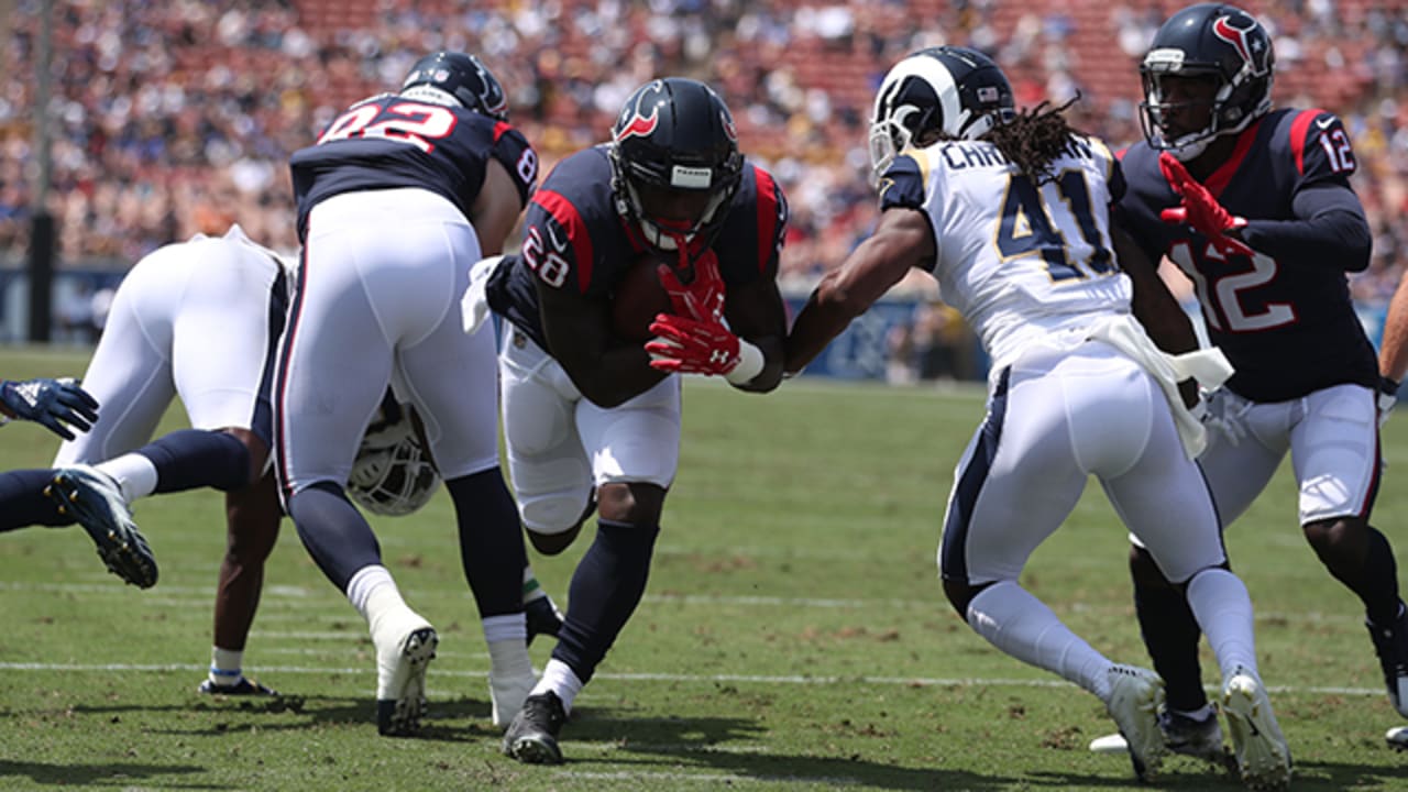 Alfred Blue pushes through defenders for 3-yard TD run