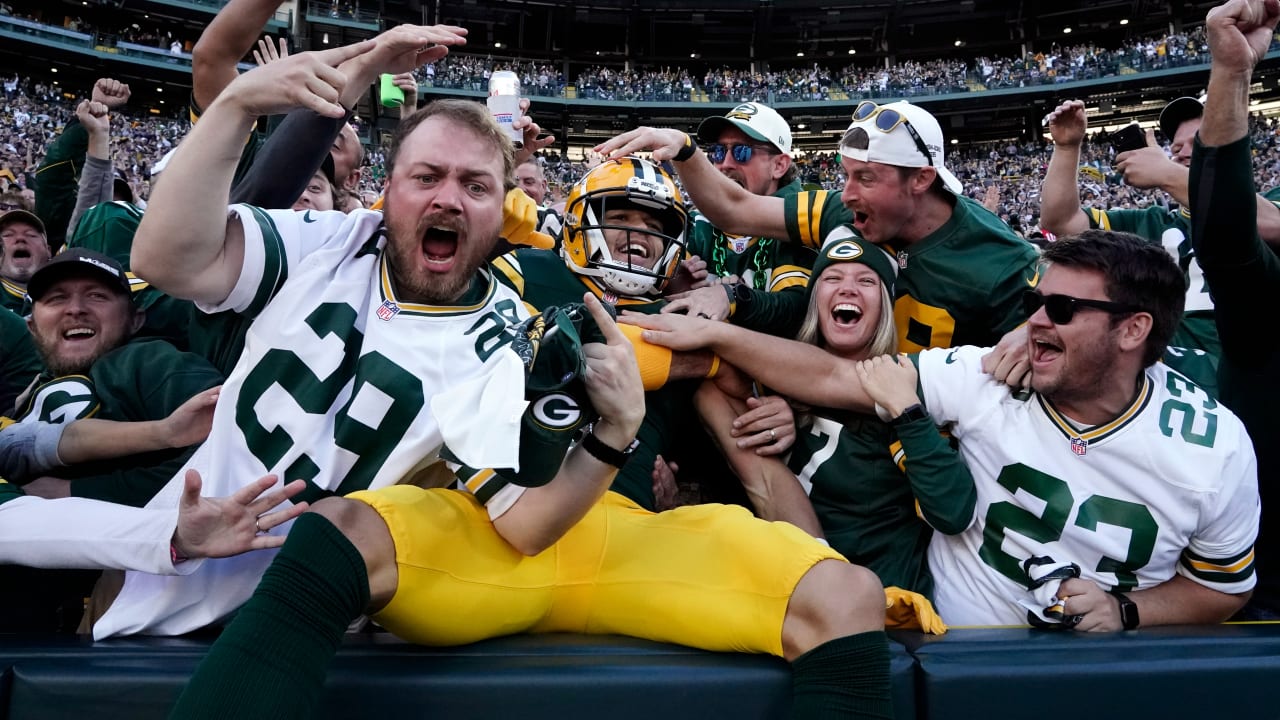 Green Bay Packers rookie wide receiver Christian Watson celebrates his ...