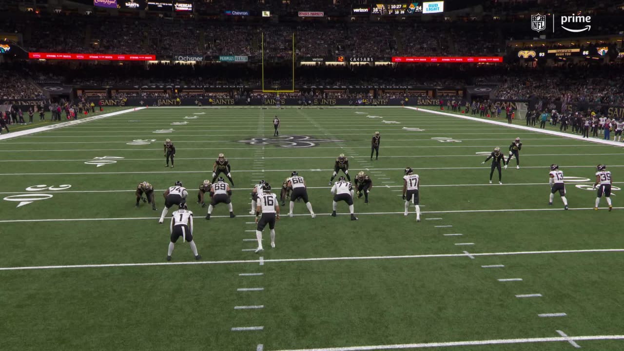 New Orleans Saints defensive end Carl Granderson contains the ...